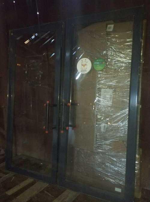 Двери металлопластиковые входные со стеклом