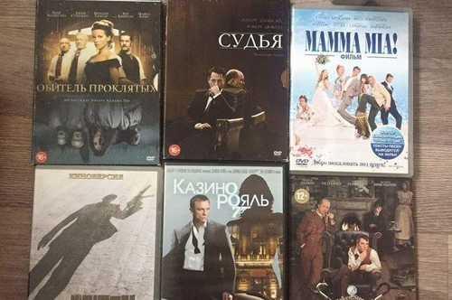 DVD диски с фильмами разных лет. В общем колоичкст