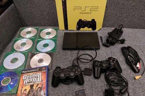 PlayStation 2 + 2 DualShock + карта памяти + 7 игр