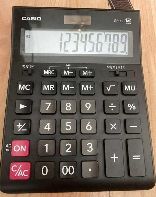 Калькулятор Casio GR-12 и Comix CS-1838