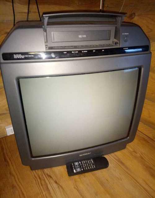 Моноблок телевизор. Телевизор видеодвойка Sharp. Видеодвойка Шарп 1994. Телевизор Sharp 1994. Моноблок Шарп 1994.
