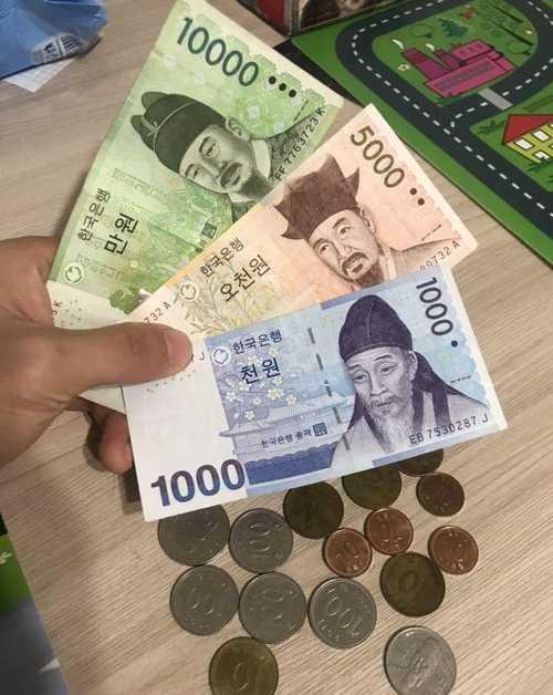 Корейские деньги. Корейские воны. Корейские деньги в руках. Корейские деньги фото. Корейские деньги на русские