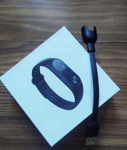 Зарядник и коробка от Mi band 2