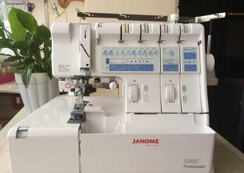 Коверлок janome 1200D