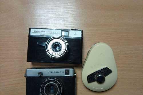 Два фотоаппарата и бритва