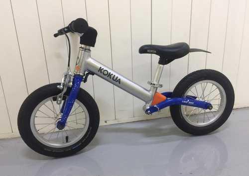 Беговел kokua likeabike jumper с тормозом и крылом