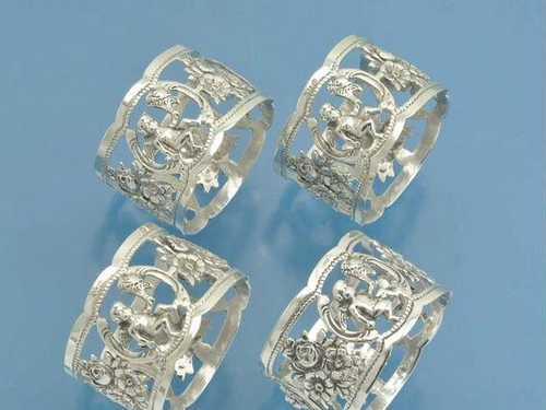 4 больших салфеточных кольца серебро 835 пр Розы