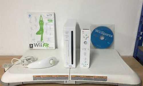 Nintendo wii + Wii Fit + гитары + арбалет + игры
