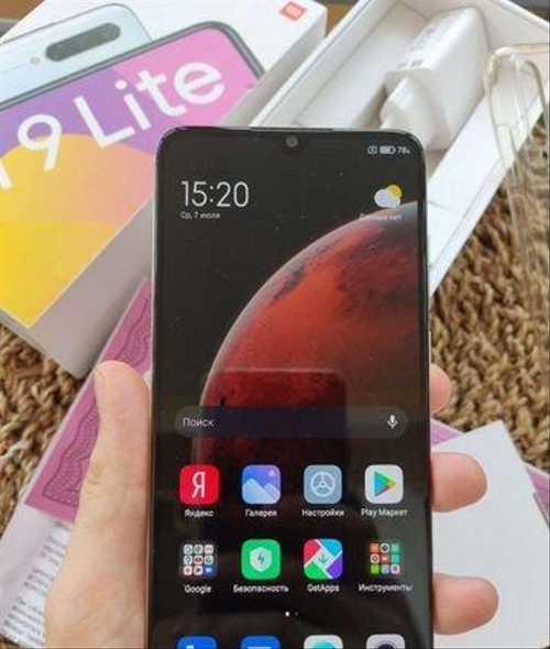 Телефон Xiaomi Mi 9 lite