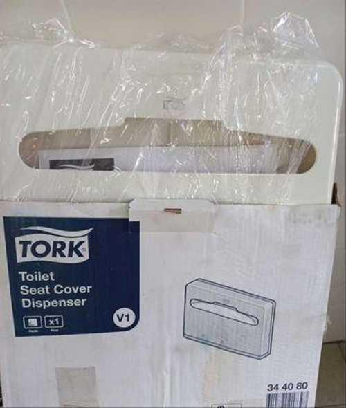 Держатель для бумажных накладок на унитаз tork