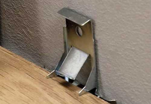 Крепеж для плинтуса Quick-Step Clips (клипсы)