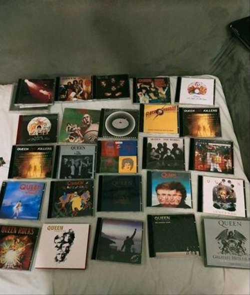 Коллекция аудио дисков группы queen