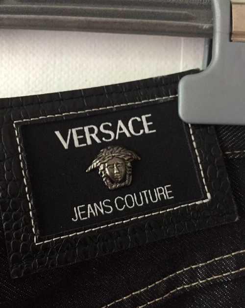 Джинсы versace