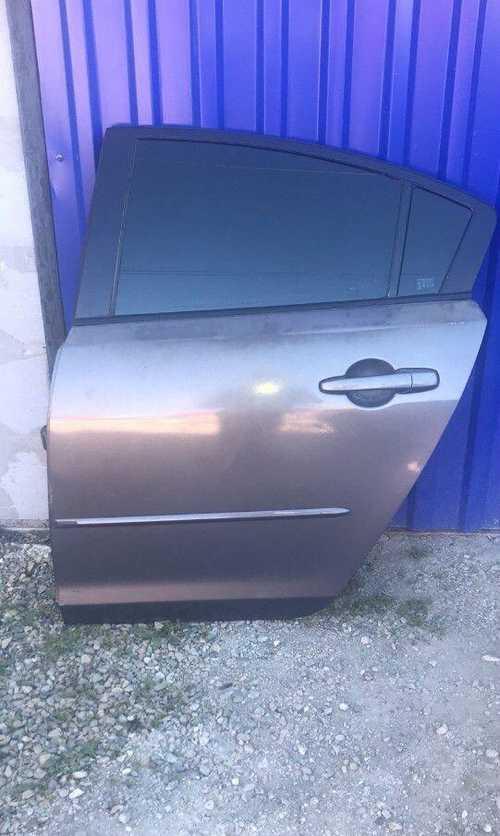Дверь левая задняя Mazda 3BK седан 2008г б.у