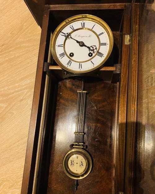 Антикварные настенные часы Генри Мозер и Ко