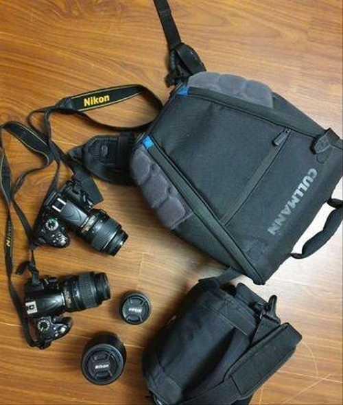 Фотоаппараты Nikon d3000 и d5100