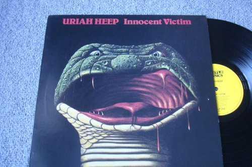 Innocent victim uriah heep. Uriah Heep Abominog 1982. Uriah Heep innocent victim обложка пластинки. Uriah Heep Abominog 1982 обложка. Abominog Uriah Heep обложка.