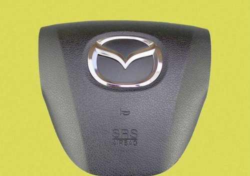 Подушка безопасности мазда 3. Mazda 3 BL подушки безопасности. Крышка подушки безопасности в рулевое колесо для Mazda. Подушка руля Мазда 3 BM. Заглушка airbag Мазда.