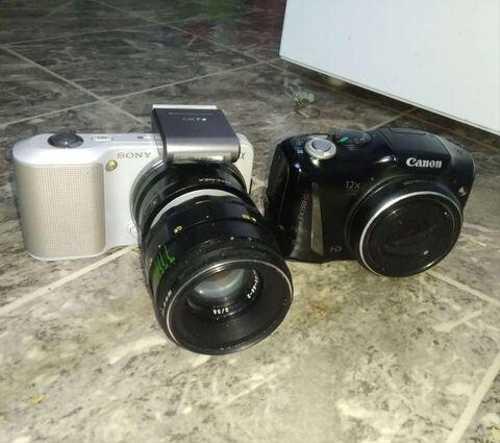 Фотоаппараты Sony NEX 3 и Canon Powershot SX150IS