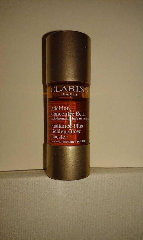 Clarins addition concentre eclat corps. Кларанс для загара. Clarins для загара. Clarins капли для загара.