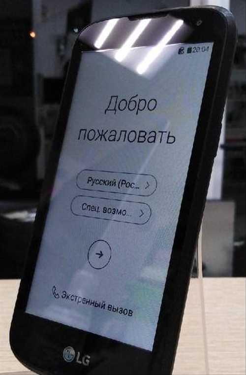 Мобильный телефон LG K100