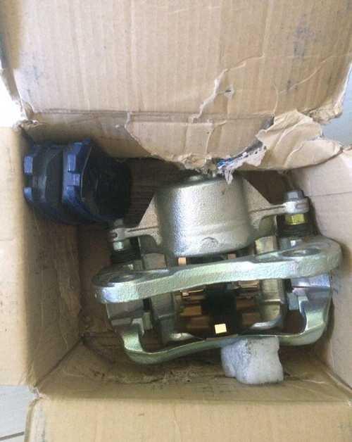 Mando EX581302E000 суппорт передний правый