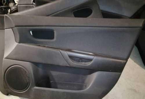 Обшивка двери (комплект) Mazda 3 BK