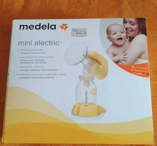 Молокоотсос medela электрический