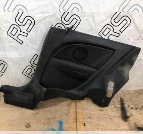 Обшивка салона задняя правая Opel Corsa D