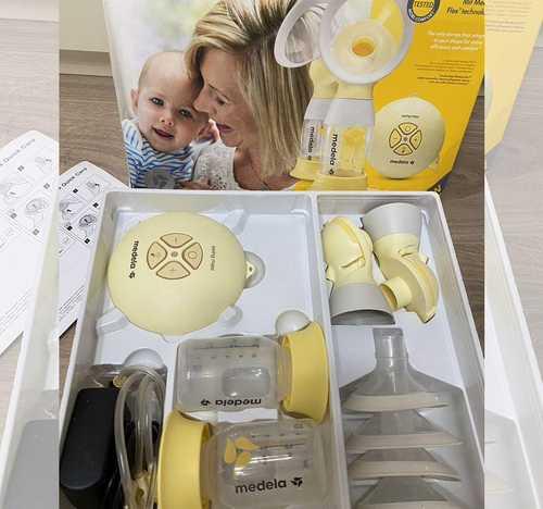 Молокоотсос электрический двойной medela