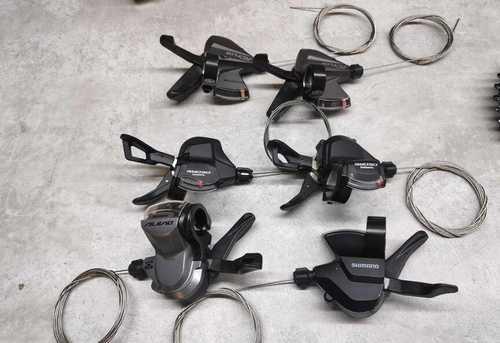 Манетки Shimano Alivio, Deore, XT
