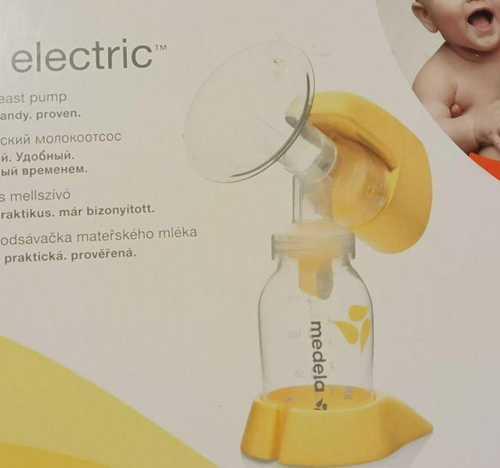 Молокоотсос medela электрический