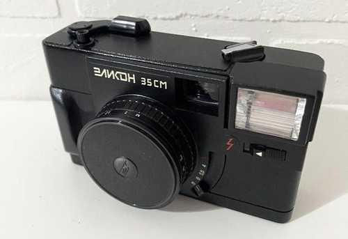 Фотоаппарат со встроенной фотовспышкой Эликон