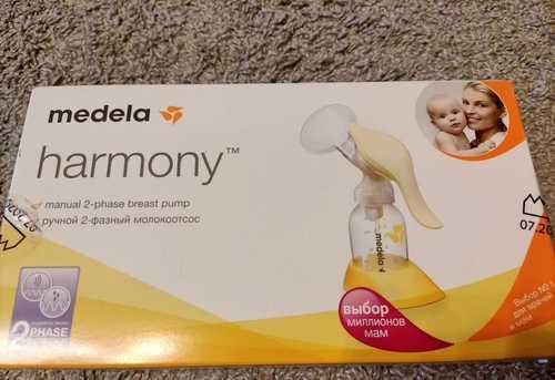 Молокоотсос ручной новый medela harmony