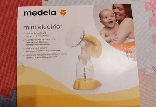 Молокоотсос medela mini electric