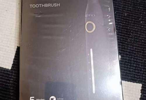 Электронная зубная щетка