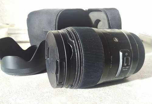 Объектив Sigma 35 мм Art для Canon