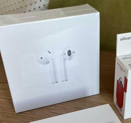 Новые беспроводные наушники airpods с аксессуарами