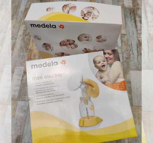 Молокоотсос medela электрический