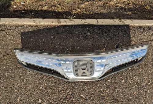 Решетка радиатора honda fit