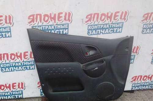 Обшивка двери передняя левая Toyota Funcargo NCP20