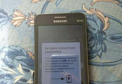 Телефон Samsung grand praim