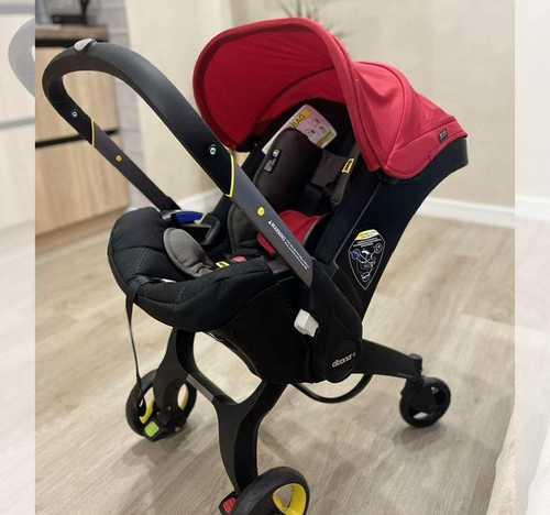 Коляска автокресло doona с базой isofix оригинал