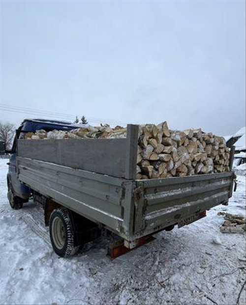 Дрова колотые зимой укладка