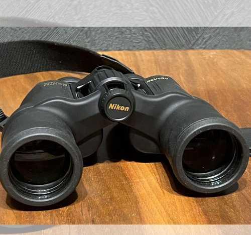 Бинокль Nikon Aculon A211 10x42 черный