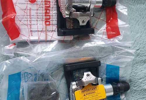 Продам контактные велопедали shimano PD M-520