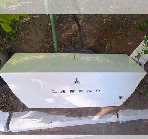 Крышка багажники Lancer es/cedia