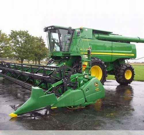 В разборе сельхозтехника John Deere