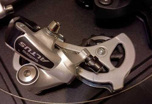 Задний переключатель Shimano Altus, Sram X3