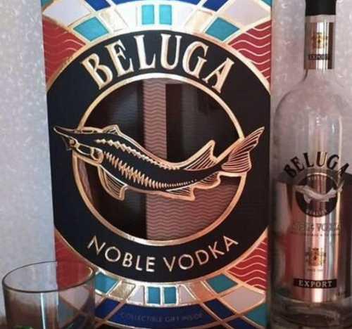 Коробка, пустая бутылка и стакан Beluga